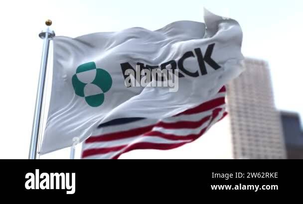 New York ,USA, October 2021: the flag with the logo of Merck waving in ...