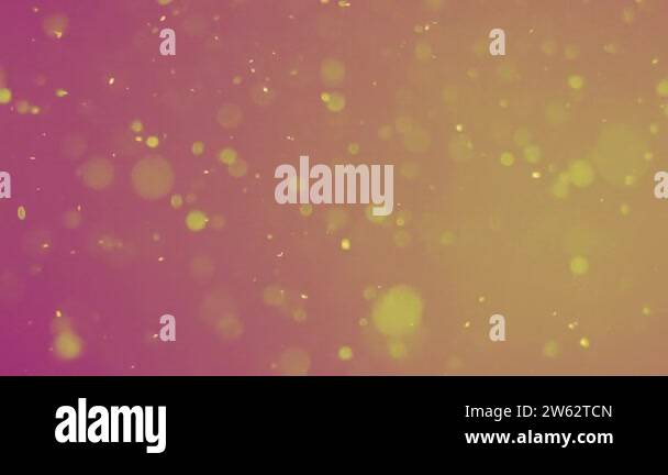 Dust particles powder effect background. Colored blurred dust is slowly ...