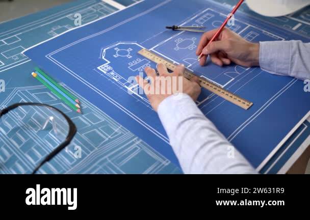 Civil engineer makes amendments to the construction plan of the house ...