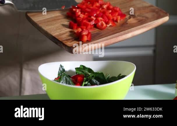 Woman cooking according the tutorial of online virtual master class ...