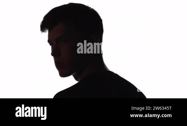 doubtful man silhouette confused guy looking back Stock Video Footage ...