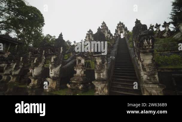 Low angle close up truck shot of stunning dragon head stone sculptures ...