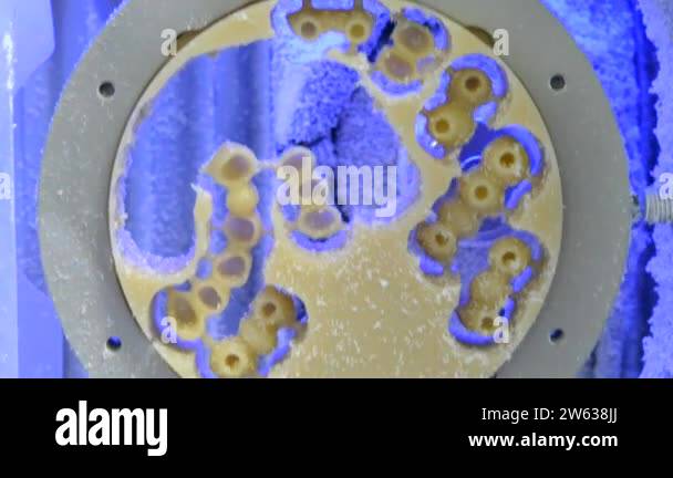Dental milling machine carving out shape of human teeth Stock Video ...