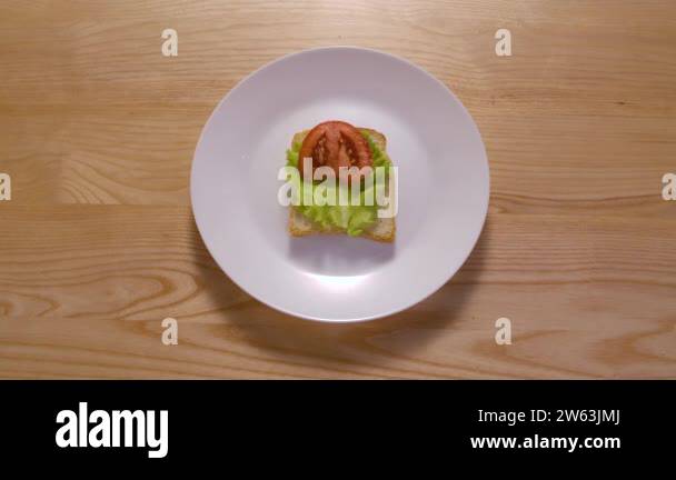 Process of making sandwich from different ingredients. Stop motion ...
