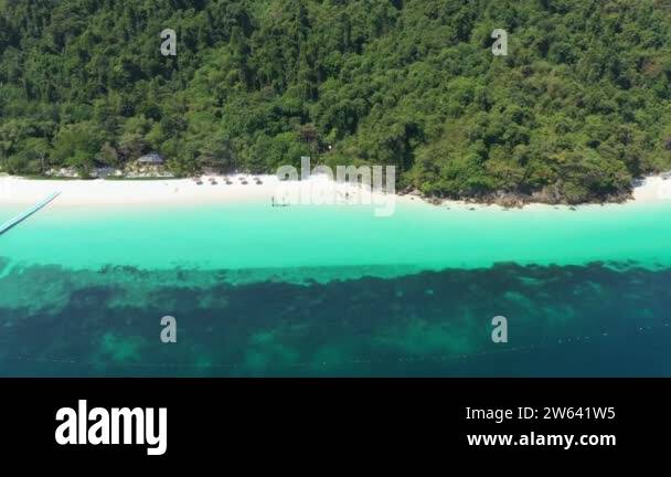 Footage B-roll of Aerial view ocean waves, beach and rocky coastline ...