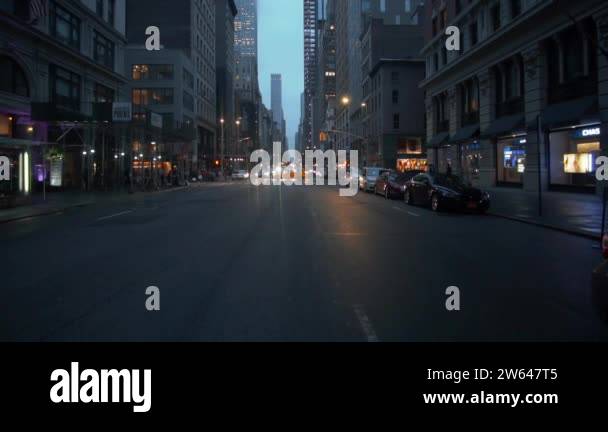 Street view of car traffic on the intersection in NYC. Slow motion of ...