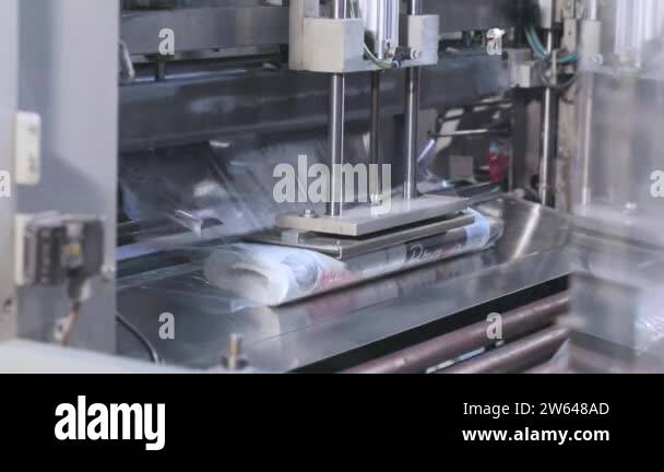 Automated wallpaper production line. Wallpaper production process in a ...