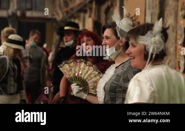 people are having fun. women dressed in ancient clothes of wartime ...