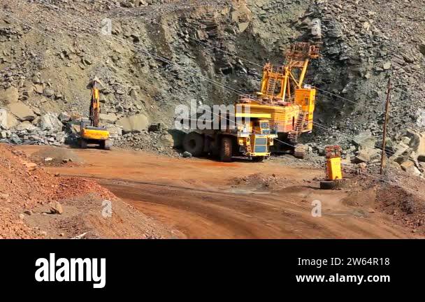 The process of mining iron ore in a quarry. Equipment for the ...