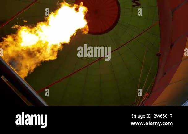 Blaze fire flaming from hot air balloon burner to inflate balloon dome ...