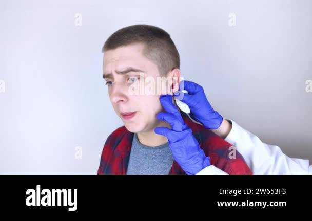 A man whose ear is bleeding. Vascular rupture, damage to the tympanic ...