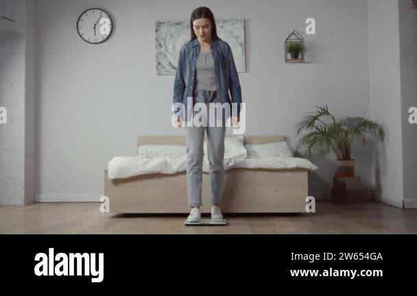 Woman sad scales Stock Videos & Footage - HD and 4K Video Clips - Alamy