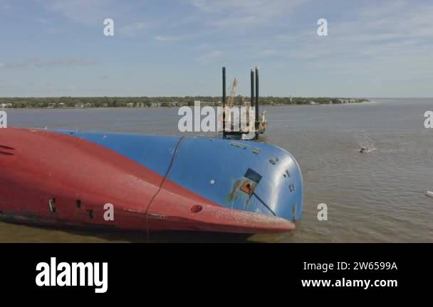 St Simons Georgia Aerial v10 flyover by overturned cargo skip ...