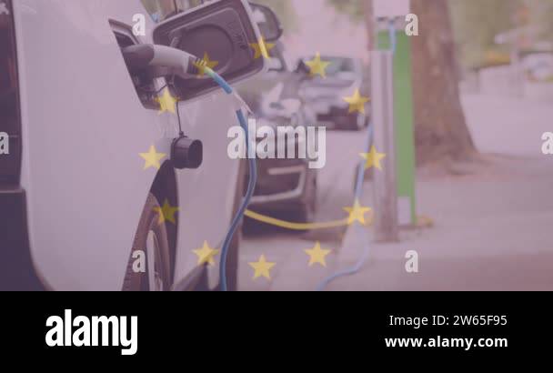 Flag of european union over electric car charging at electric vehicle ...
