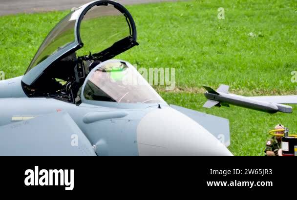 Canopy of a modern military fighter plane opens to let pilot down after ...