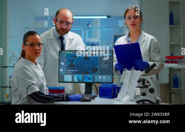 Scientists looking camera in laboratory Stock Videos & Footage - HD and ...