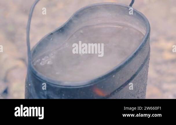 Camping kettle over fire Stock Videos & Footage - HD and 4K Video Clips ...
