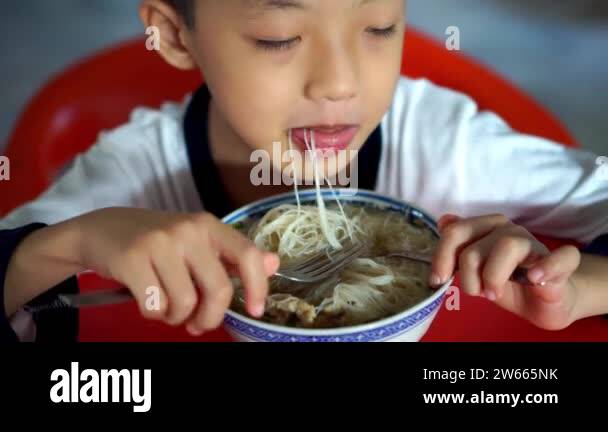 Kid eating in house Stock Videos & Footage - HD and 4K Video Clips - Alamy