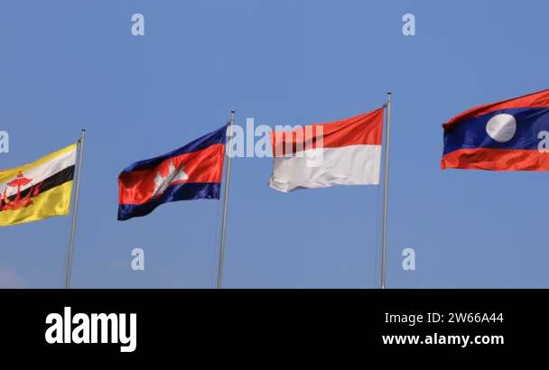 National Flags of ASEAN countries behind the sky in Ho Chi Minh panning ...