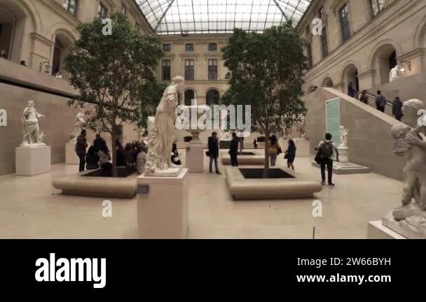 Statues and sculptures in the Louvre museum in Paris. France. Video in ...