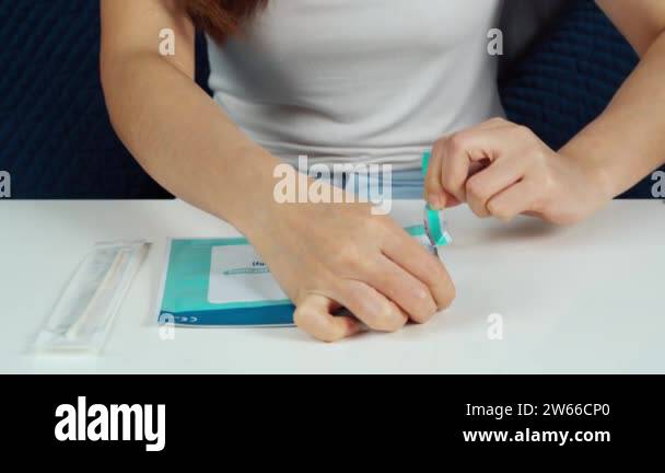 hand opening package of Coronavirus(Covid-19) or SARS-CoV-2 Antigen ...