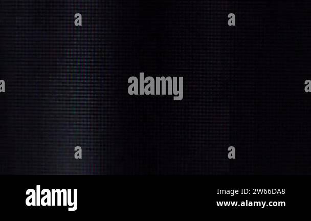 Abstract Glitch Error from the old VHS tape on TV Screen macro view ...