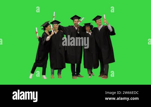 Students taking a group picture at their graduation party on a Green ...