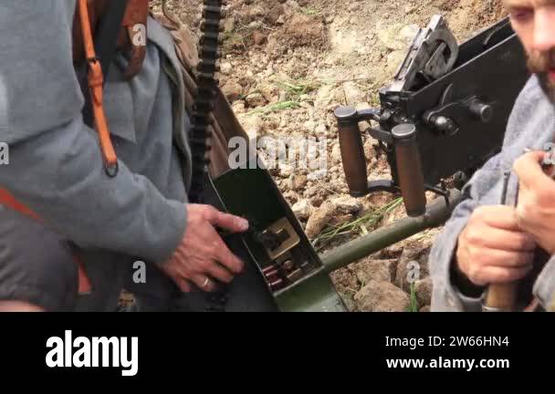 The soldier puts machine-gun tape in a drawer. The first world war. WWI ...