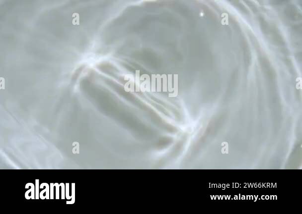 Water splash. Water Drop Creating Ripple. Pure water with reflections ...