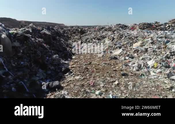Open city garbage dump, general plan, top view, camera movement. Birds ...