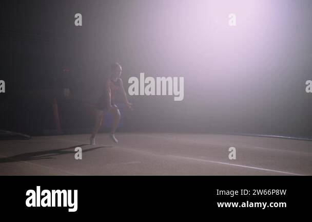 floor exercise of young sporty girl at completion by artistic ...