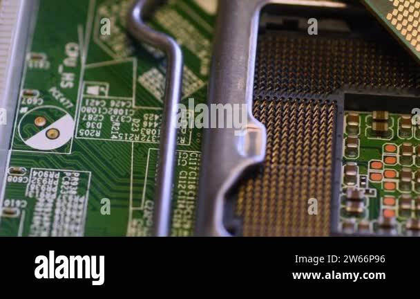 Detail of the Socket of PC Motherboard and components with CPU Computer Processors over Stock ...