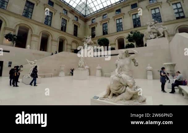 Statues and sculptures in the Louvre museum in Paris. France. Video in ...