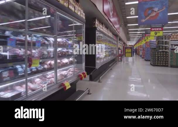 Sao Paulo, Brazil, January 24, 2021. people choose products in frozen ...