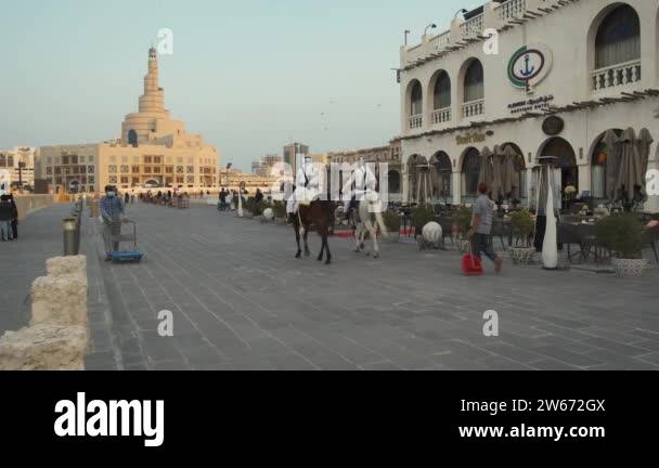 Souq Waqif in Doha Qatar zooming in and panning afternoon shot showing ...