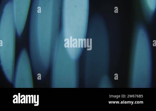 Techy blue optical lens flares transition that is a seamless loop with ...