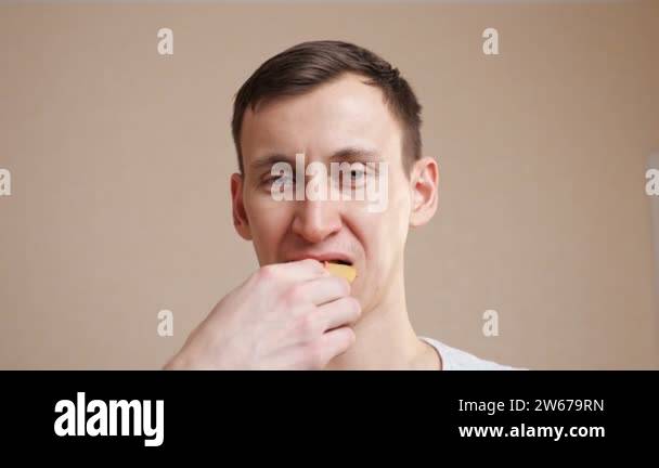 Man biting cookie Stock Videos & Footage - HD and 4K Video Clips - Alamy