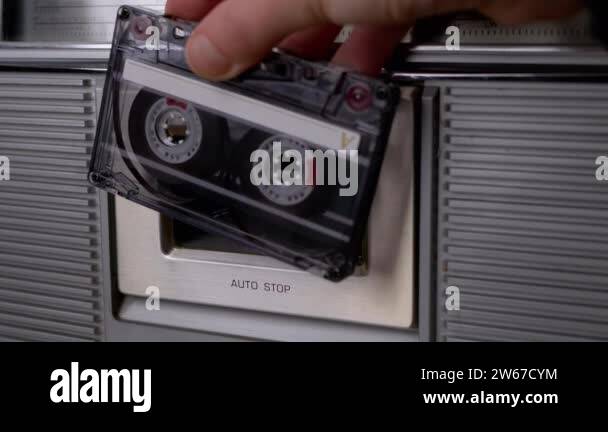 Female Hand Rotates Old Transparent Cassette and Inserts Into Tape ...