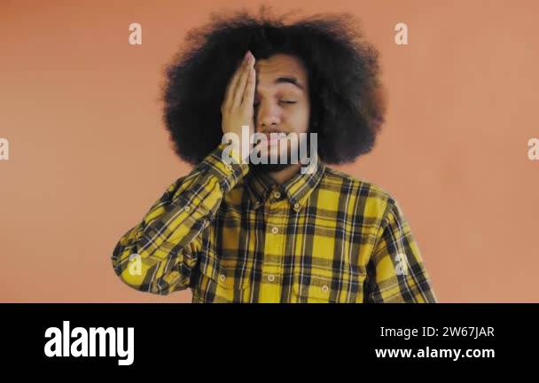 The portrait of a young man making a face gesture, as if there is no, I ...
