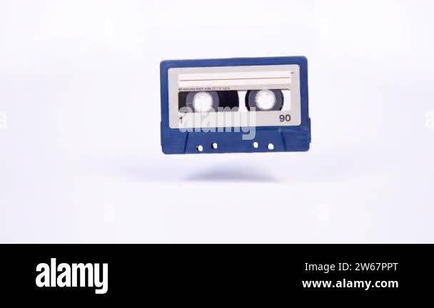 Cassette with tape spilling out Stock Video Footage - Alamy