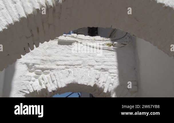 Ancient arcs in a moorish street in Comares, Axarquia, Spain. Tilt ...