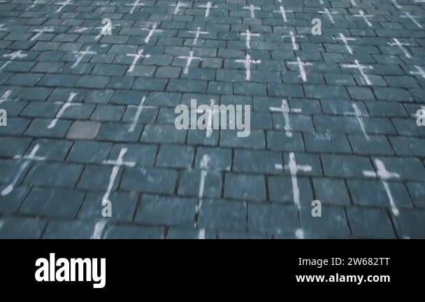 Camera movement on a stone sidewalk. The symbols of the crosses are ...