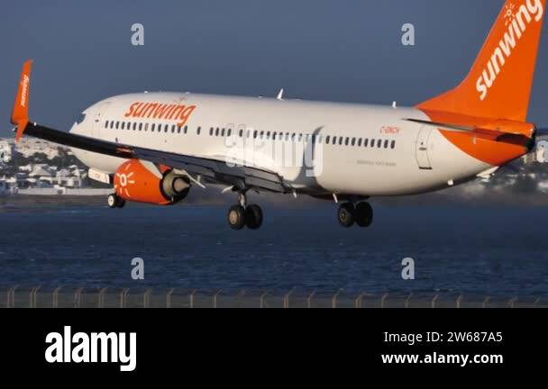 Sunwing Airline landing boeing 737-800 on the airstripe of the ...