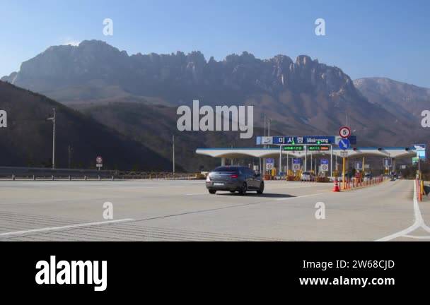 Tollgate to Misiryeong Expressway with the background of Ulsan Rock on ...
