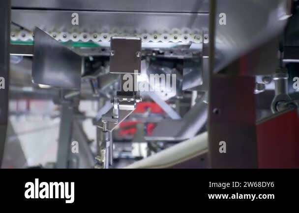 Working production equipment. Moving mechanical parts of a complex ...