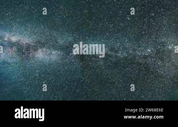 Travel through the starry space inside the dark green Andromeda galaxy ...