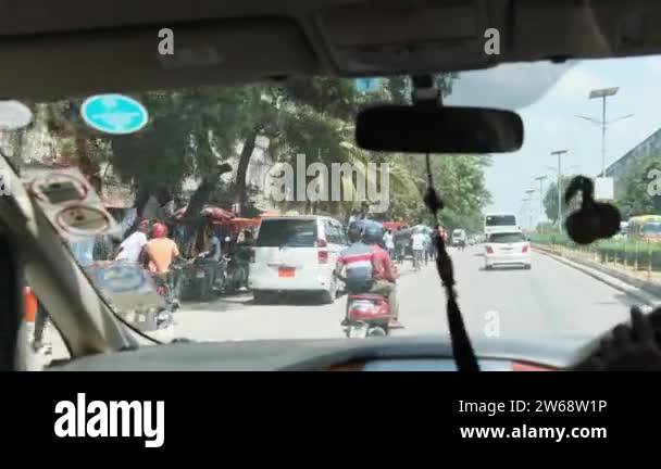 Local African flea market in downtown Stone Town, Zanzibar, Poverty and ...