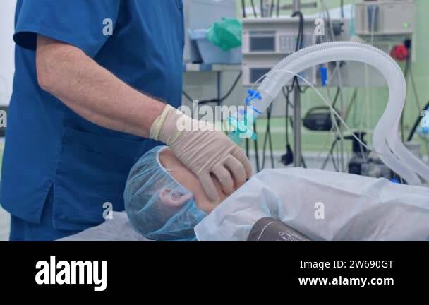 Introducing a patient to anesthesia before surgery Stock Video Footage ...