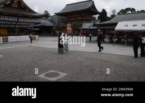 Photographing A Japanese Couple Marying At The Yasaka Shrine At Kyoto