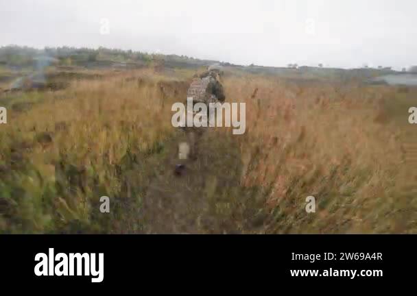 Point-of-view footage of group of professional special forces soldiers ...